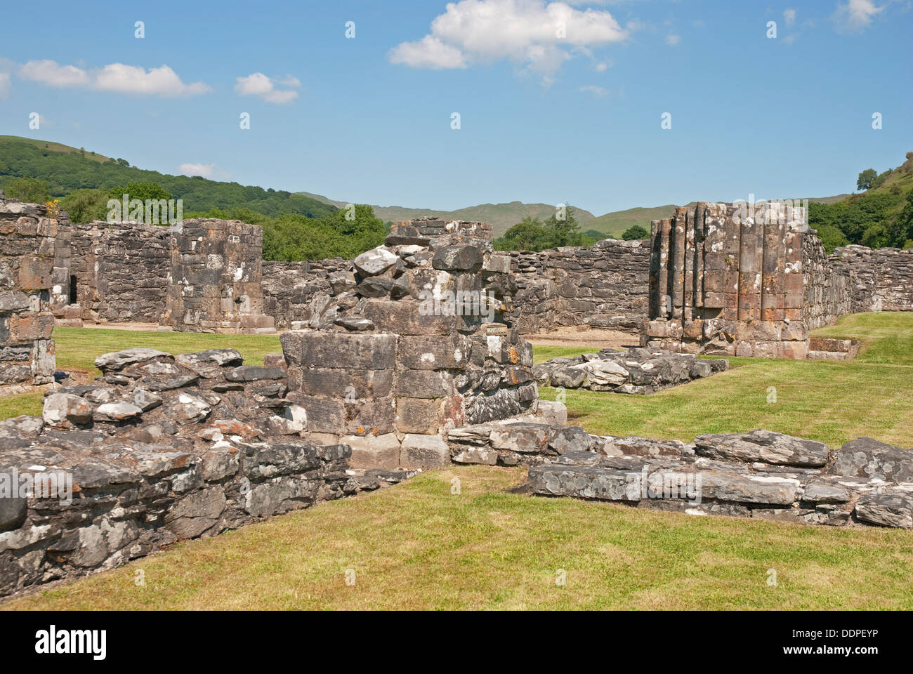 The 12th century abbey ruins of Strata Florida with Cambrian Mountains ...