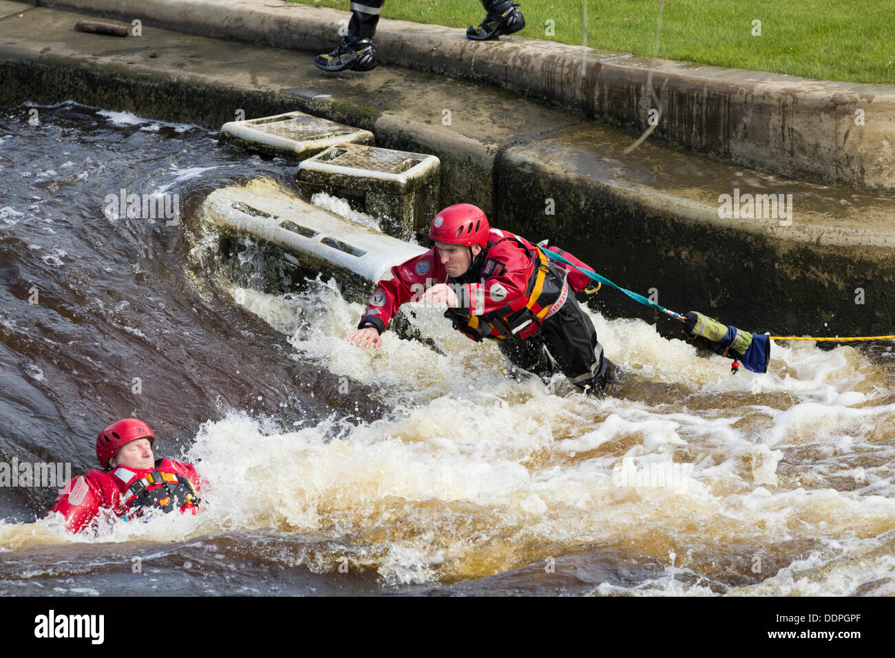 Firefighters practising rescue techniques in fast moving waters at Tees ...