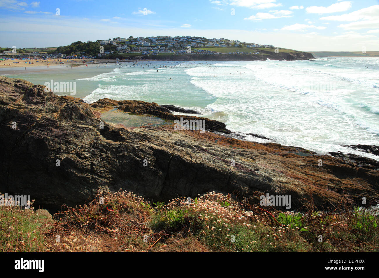 Busy Polzeath beach, late summer viewed from New Polzeath, North ...
