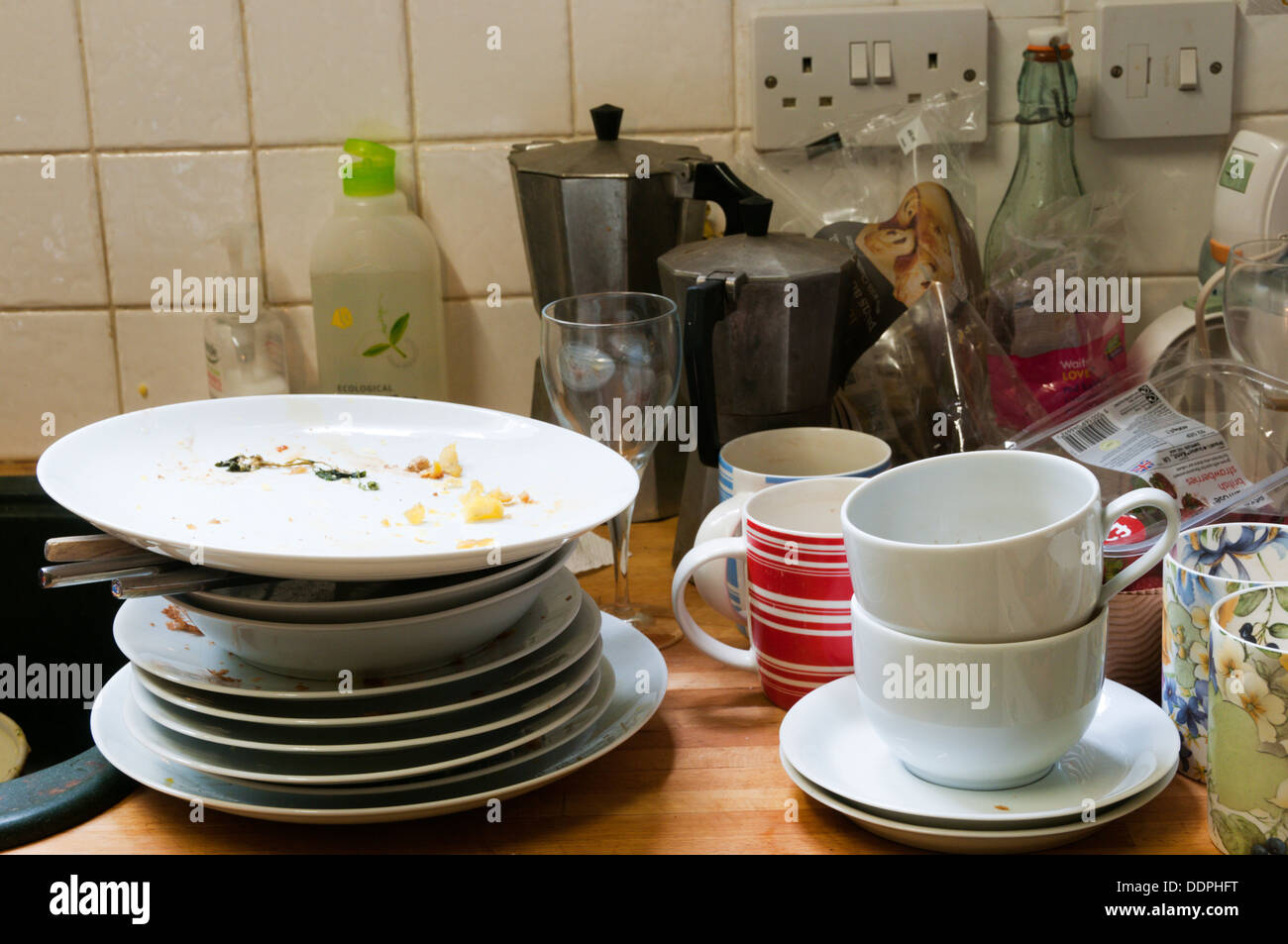 Stack of dirty cups and saucers hi-res stock photography and images - Alamy