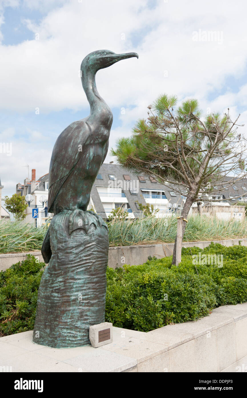 The bronze statue of a grand cormorant at the corniche Concarneau ...