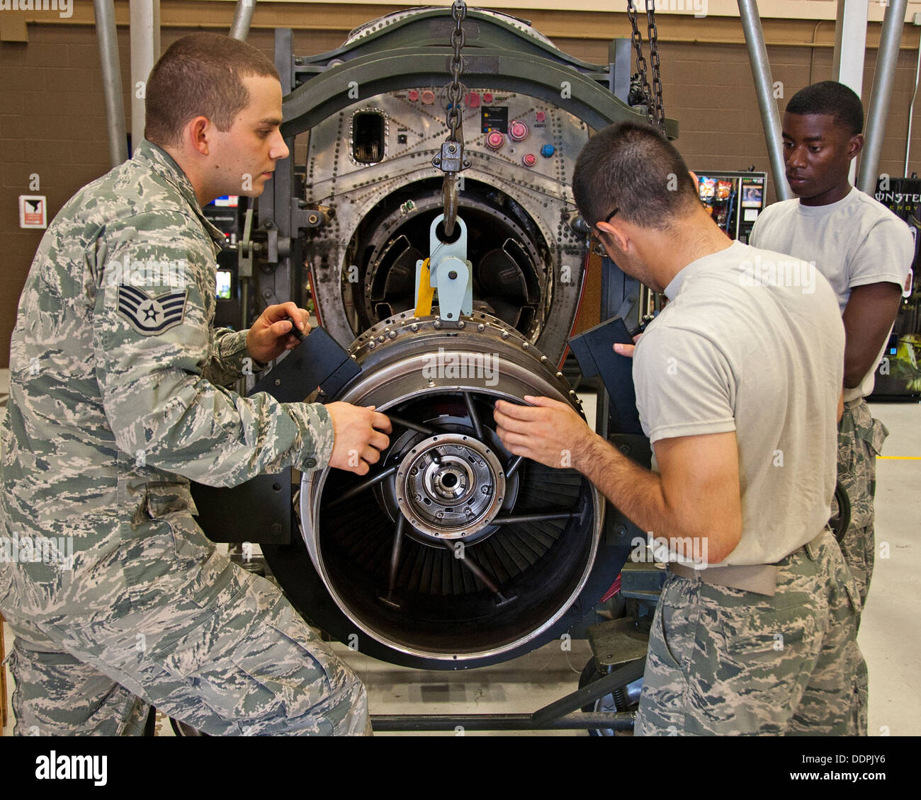 U.S. Air Force Instructor Staff Sgt. Christopher Walker, Airman Vivek ...