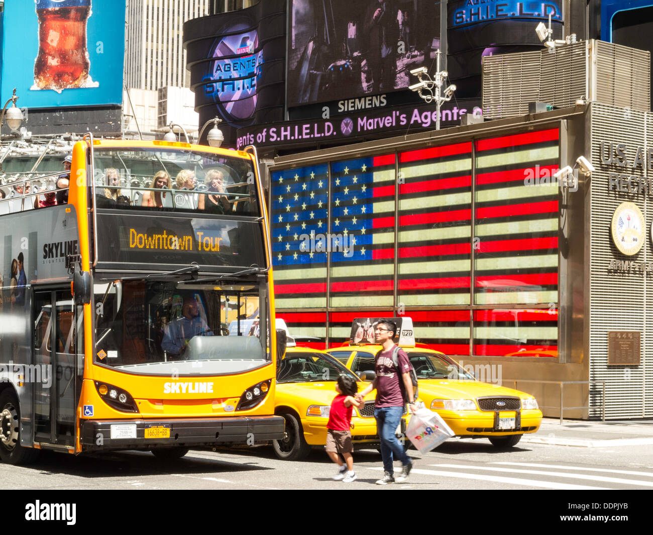 Tour Bus, Pedestrians and U.S Armed Forces Recruiting Station Featuring ...
