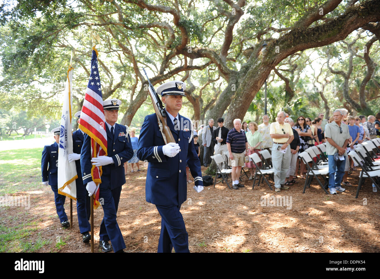 Members of the U.S. Coast Guard Auxiliary post the colors Saturday, Aug ...