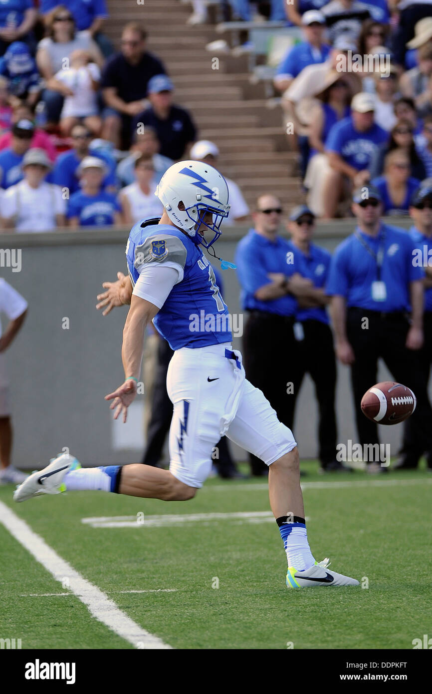 David Baska, a senior, punts the ball as the U.S. Air Force Academy met ...