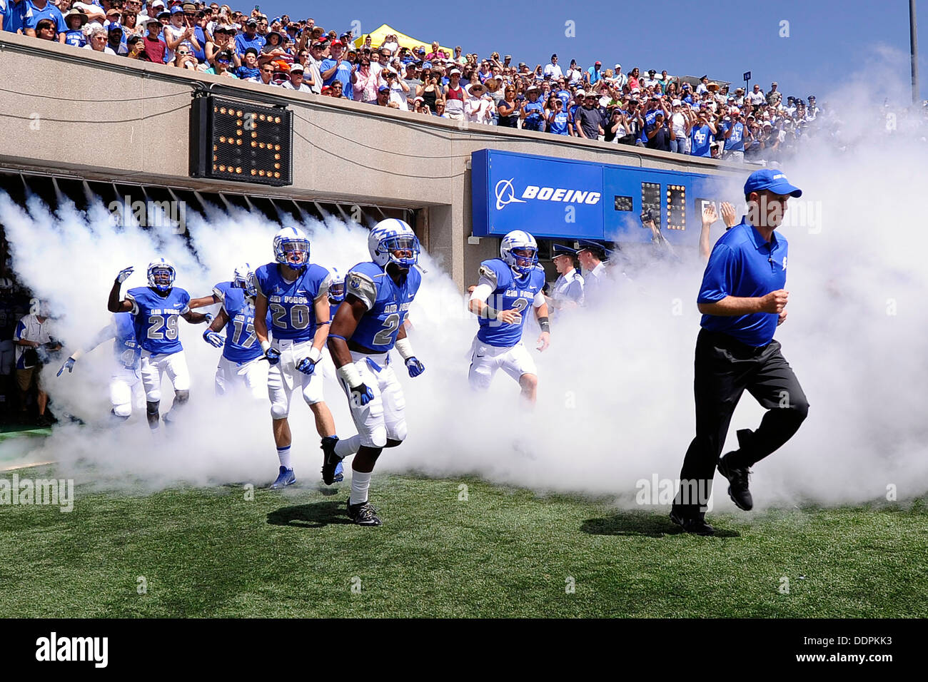 Head coach Troy Calhoun leads the U.S. Air Force Academy Falcons onto ...