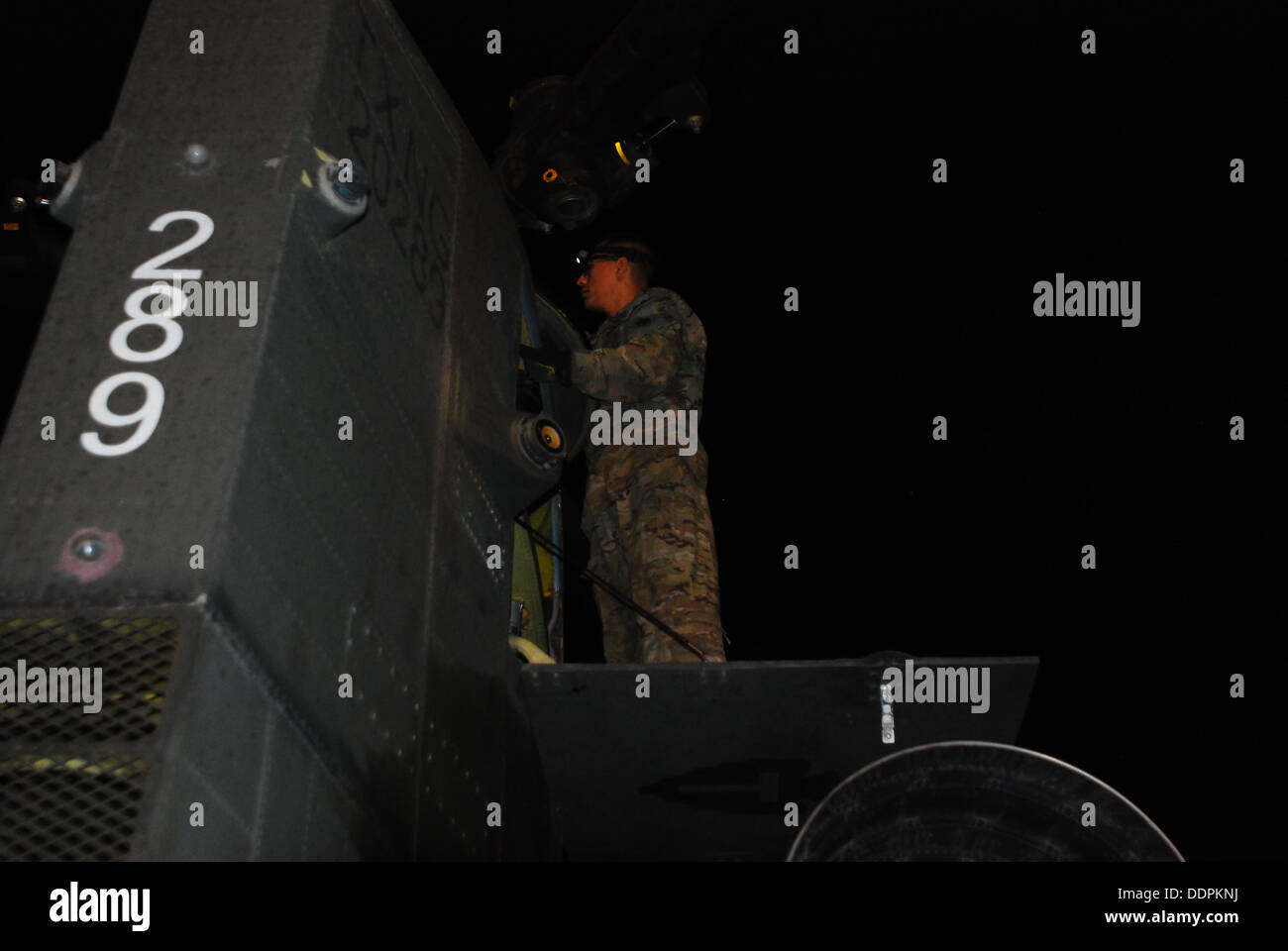 Staff Sgt. Ernie Botello, a CH-47 Chinook helicopter flight engineer ...
