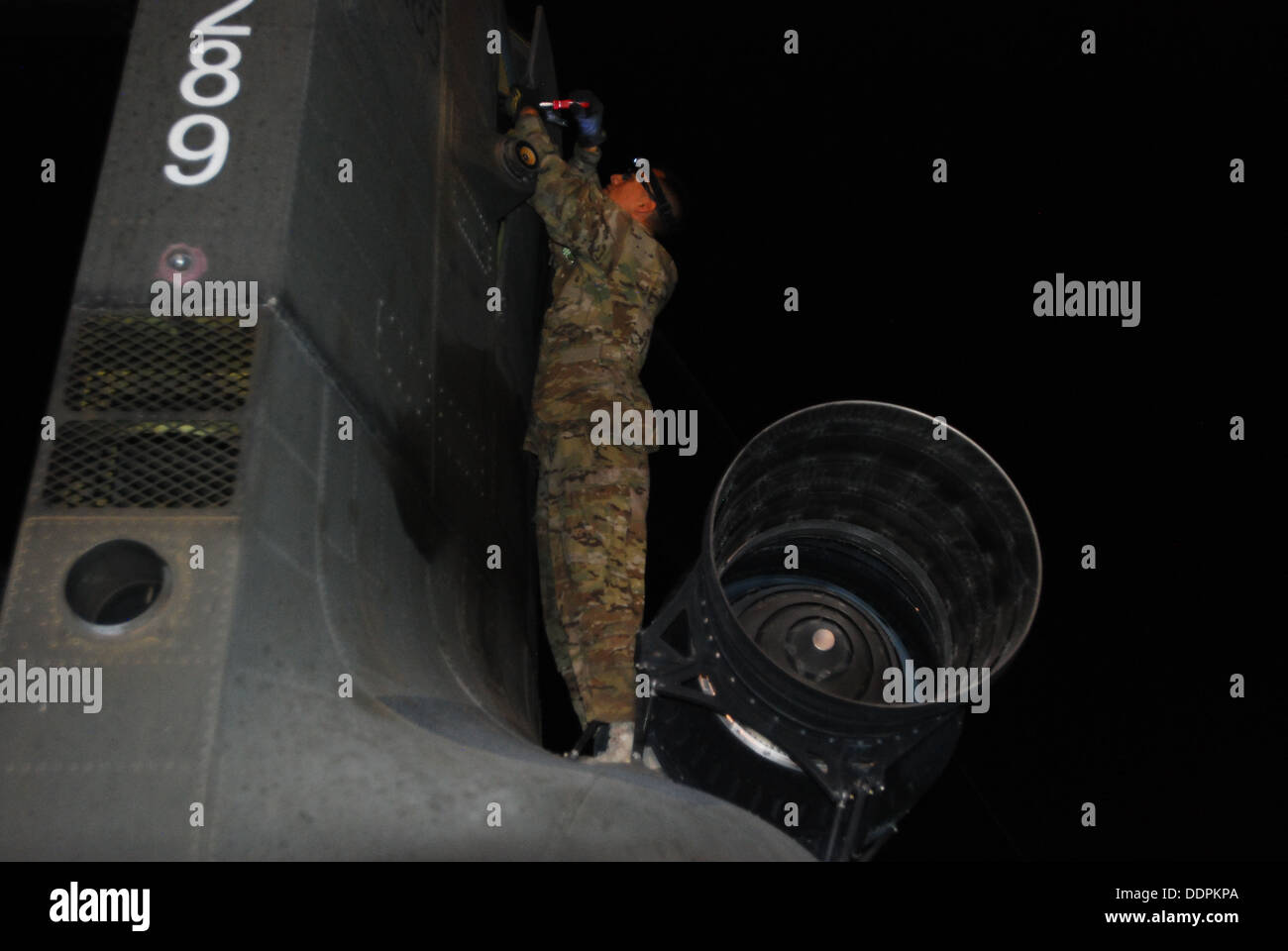 Staff Sgt. Ernie Botello, a CH-47 Chinook helicopter flight engineer ...