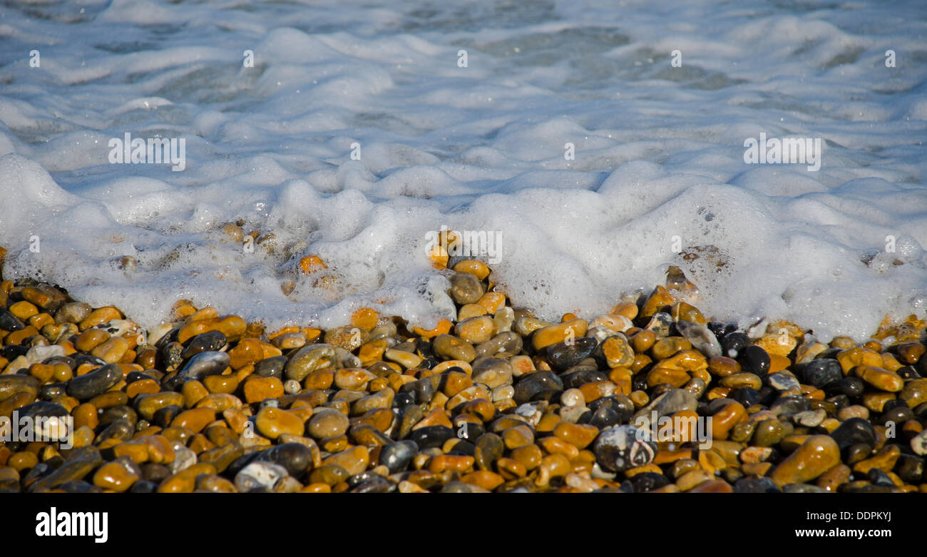waves on shingle beach Stock Photo - Alamy
