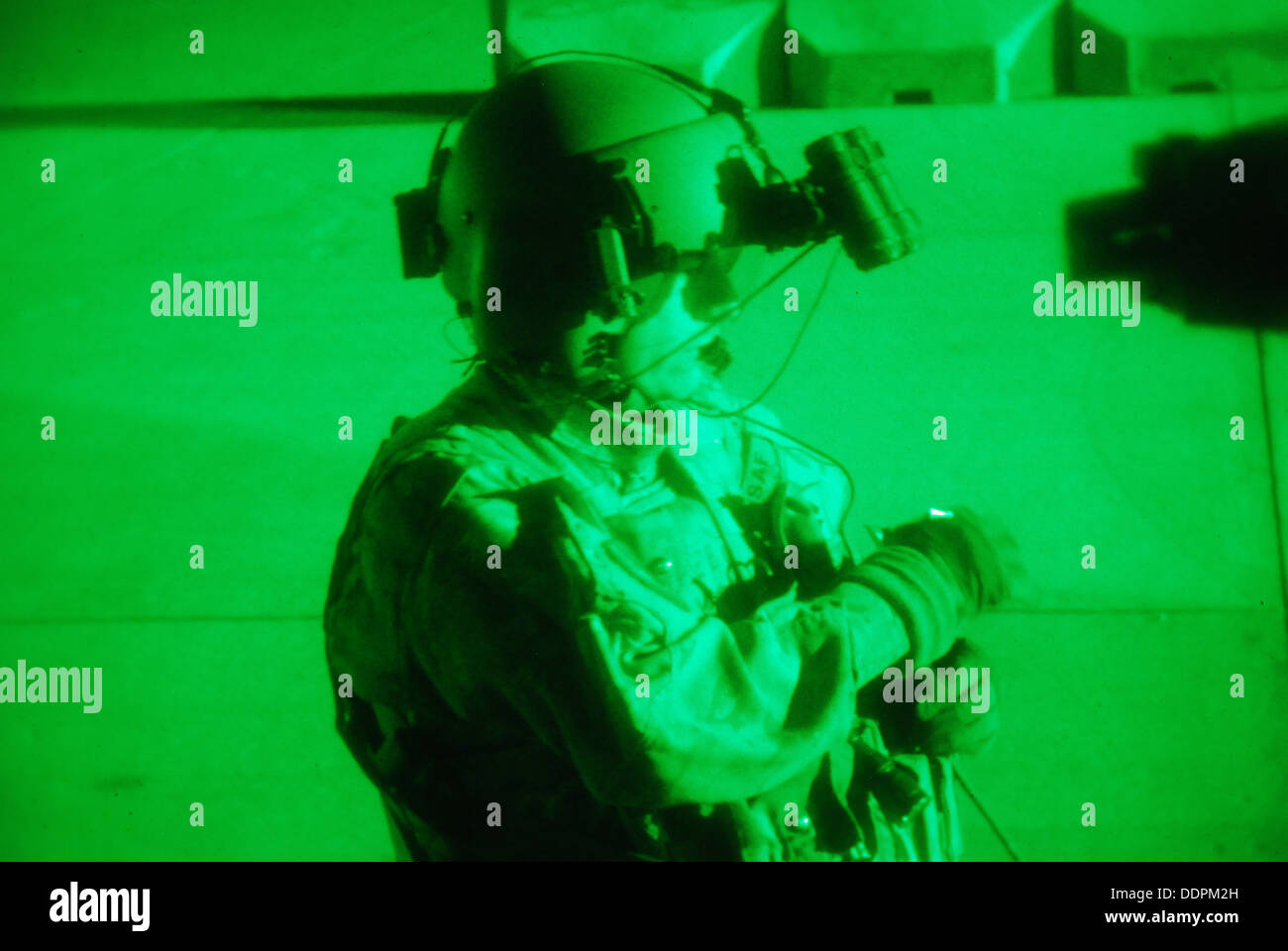 Staff Sgt. Ernie Botello, a CH-47 Chinook helicopter flight engineer ...