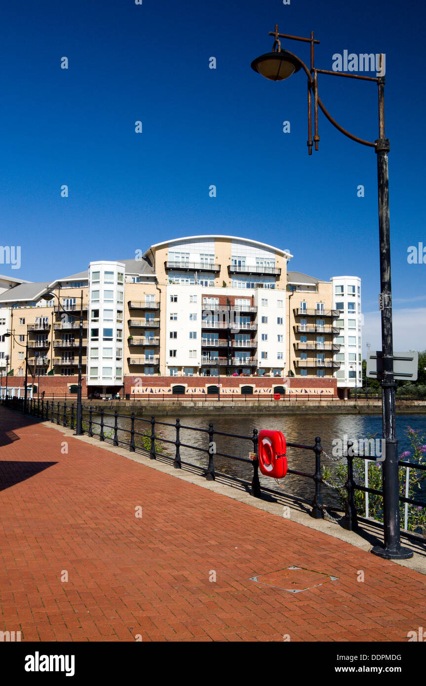 Roath Basin and modern block of flats, Cardiff Bay, Wales Stock Photo ...