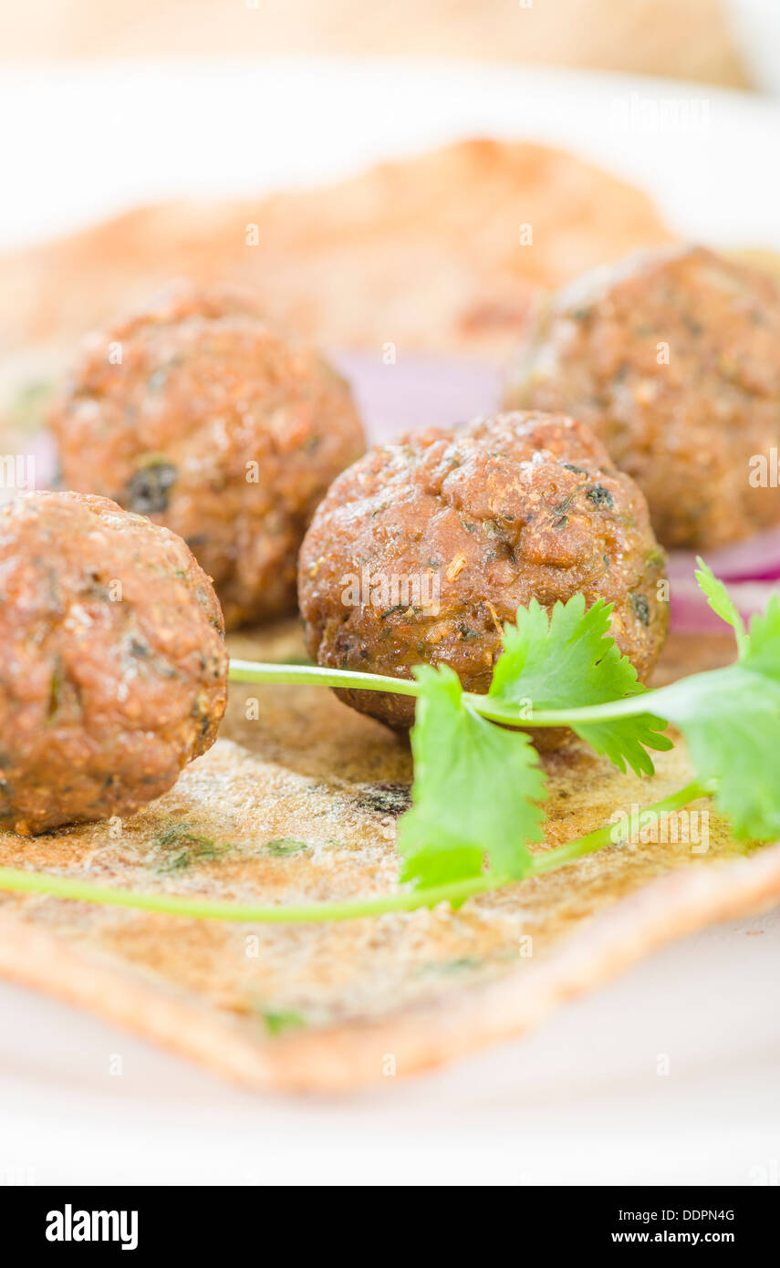 Kati Roll - Kofta kebabs and red onion pickle rolled in a paratha fried ...