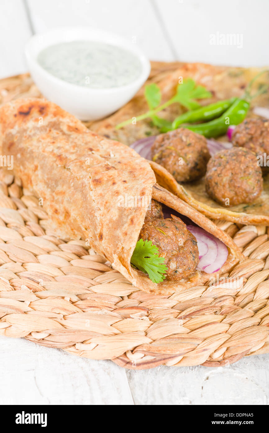 Kati Roll - Kofta kebabs and red onion pickle rolled in a paratha fried ...