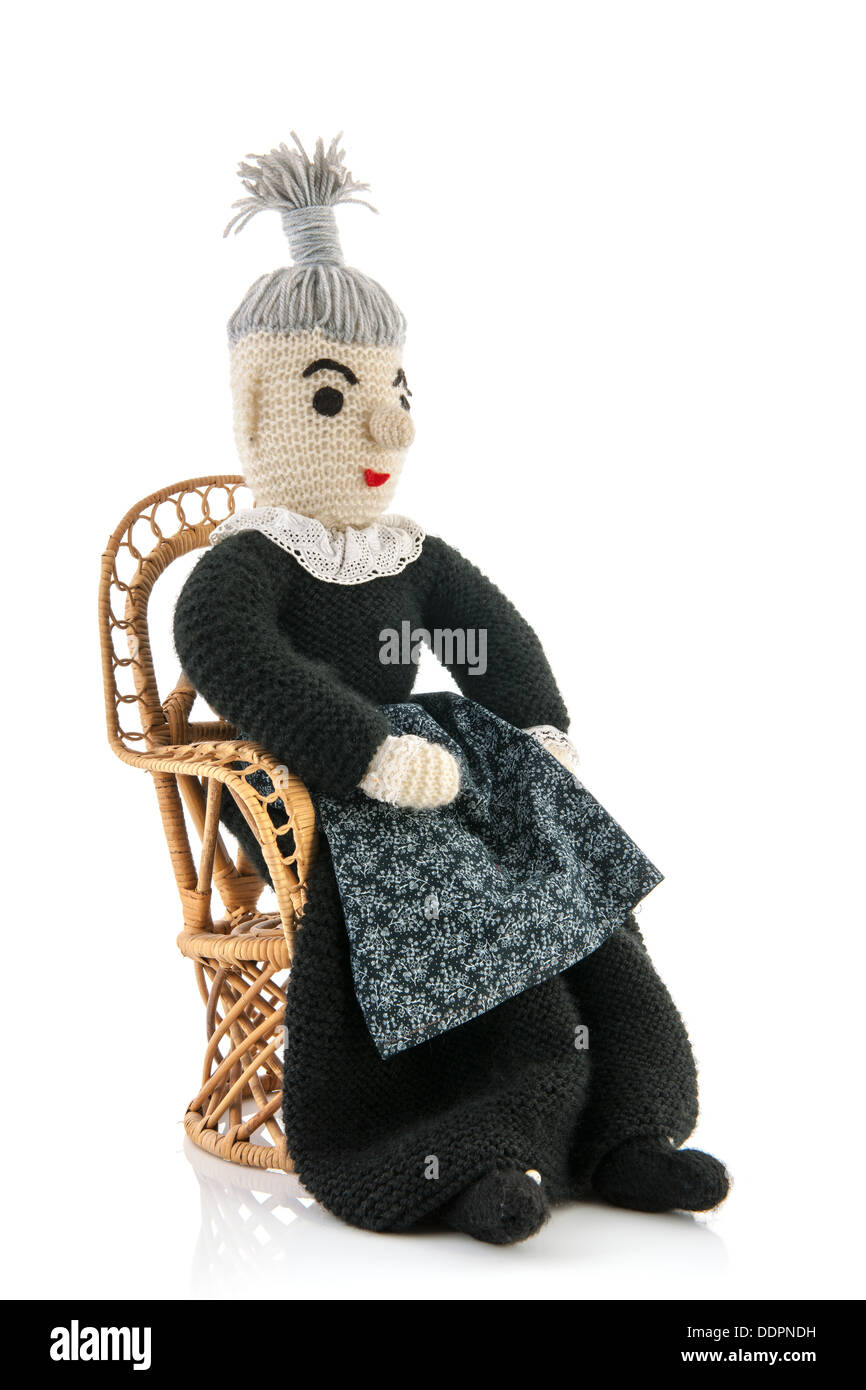 hand knitted grandma sitting on chair Stock Photo - Alamy