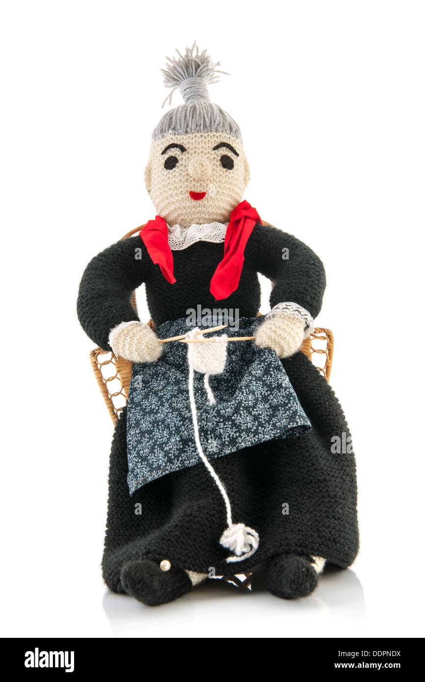 hand knitted grandma sitting on chair and knitting Stock Photo - Alamy
