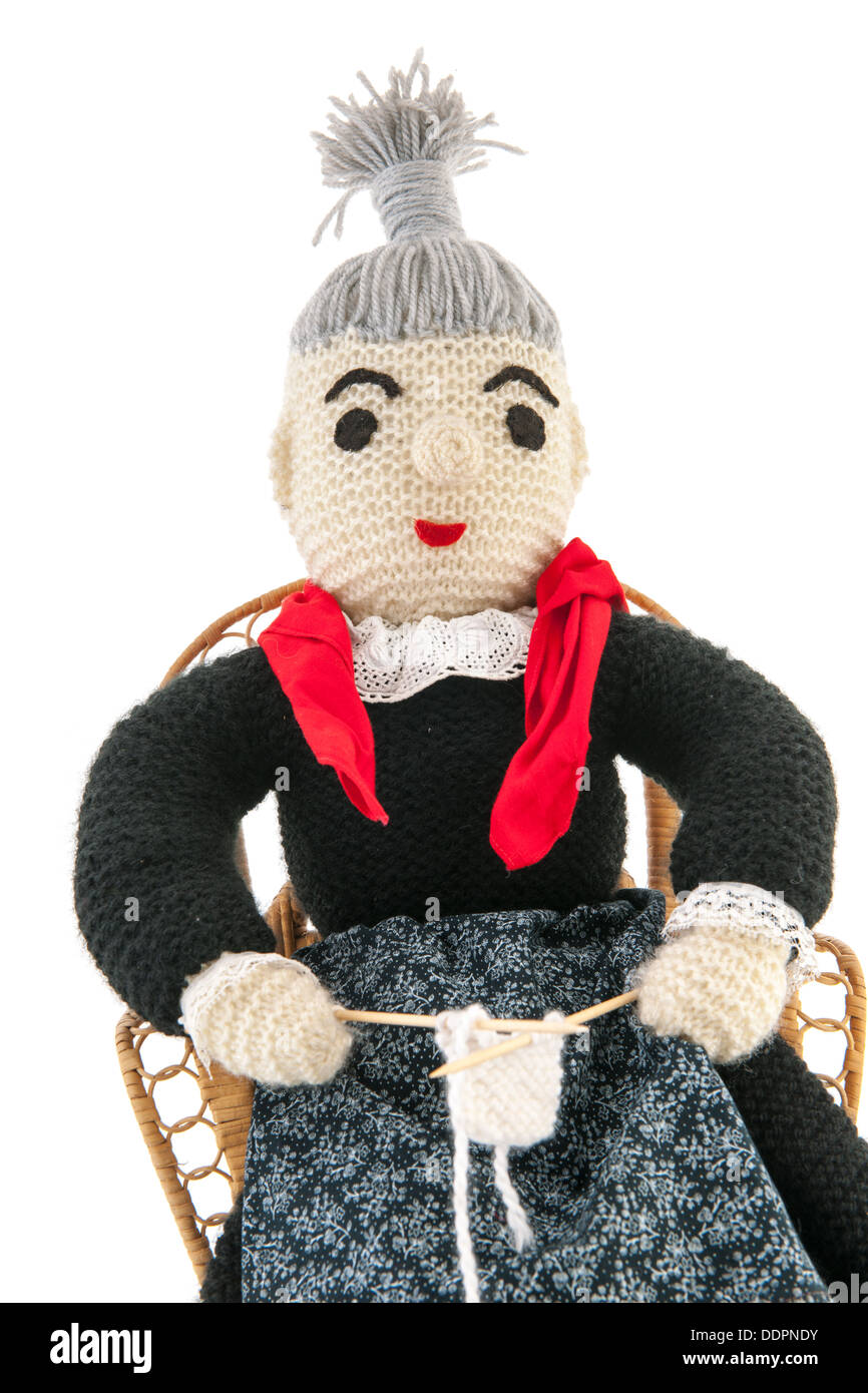 hand knitted grandma sitting on chair Stock Photo - Alamy