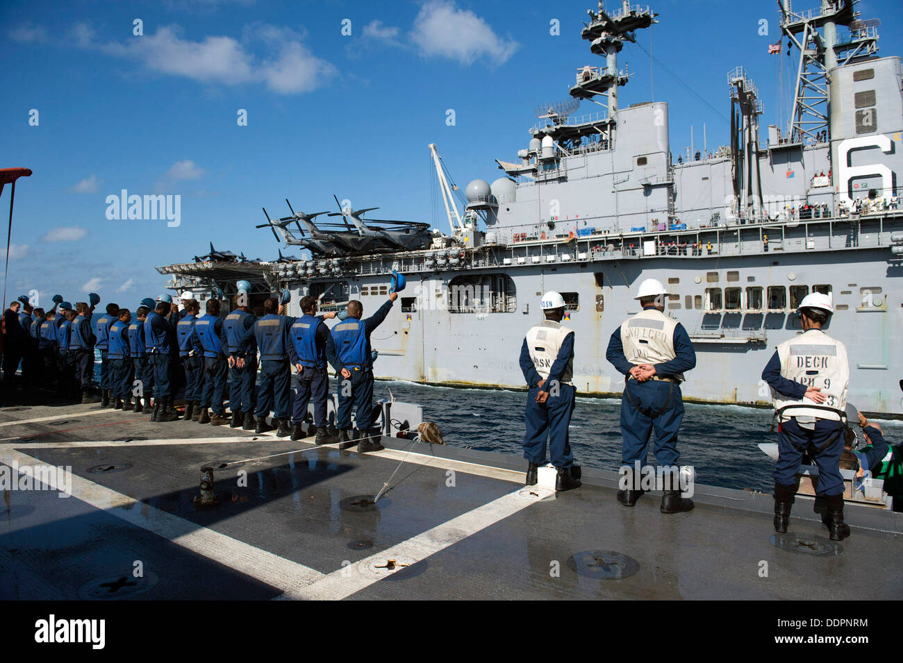 Sailors assigned to amphibious transport dock ship USS Denver (LPD 9 ...