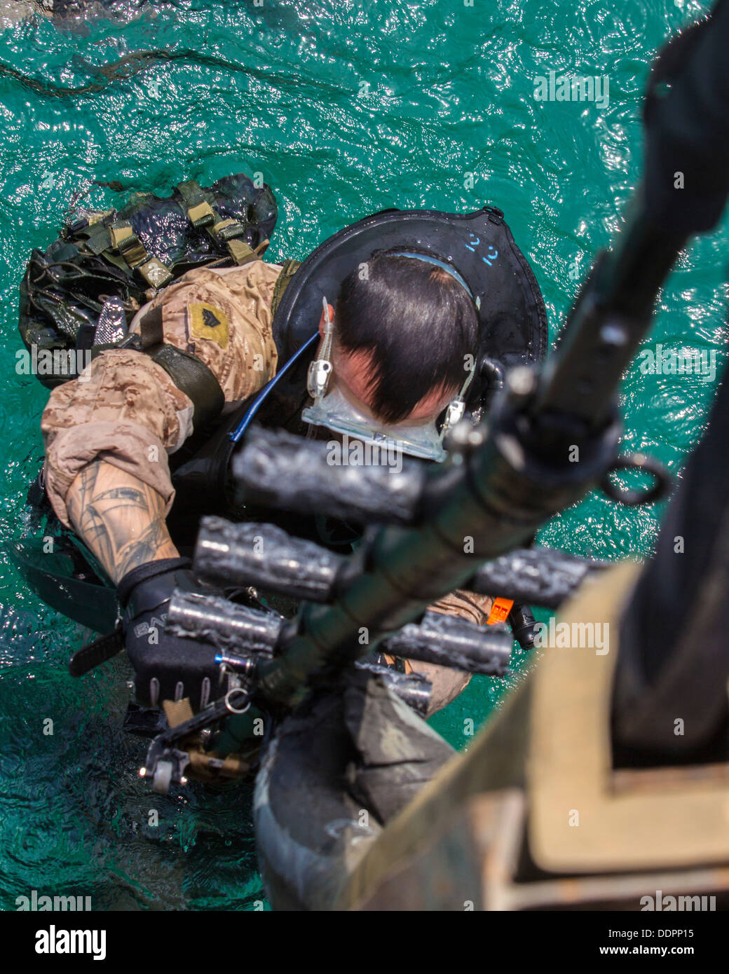 A U.S. Marine assigned to Force Reconnaissance Platoon, Maritime Raid ...