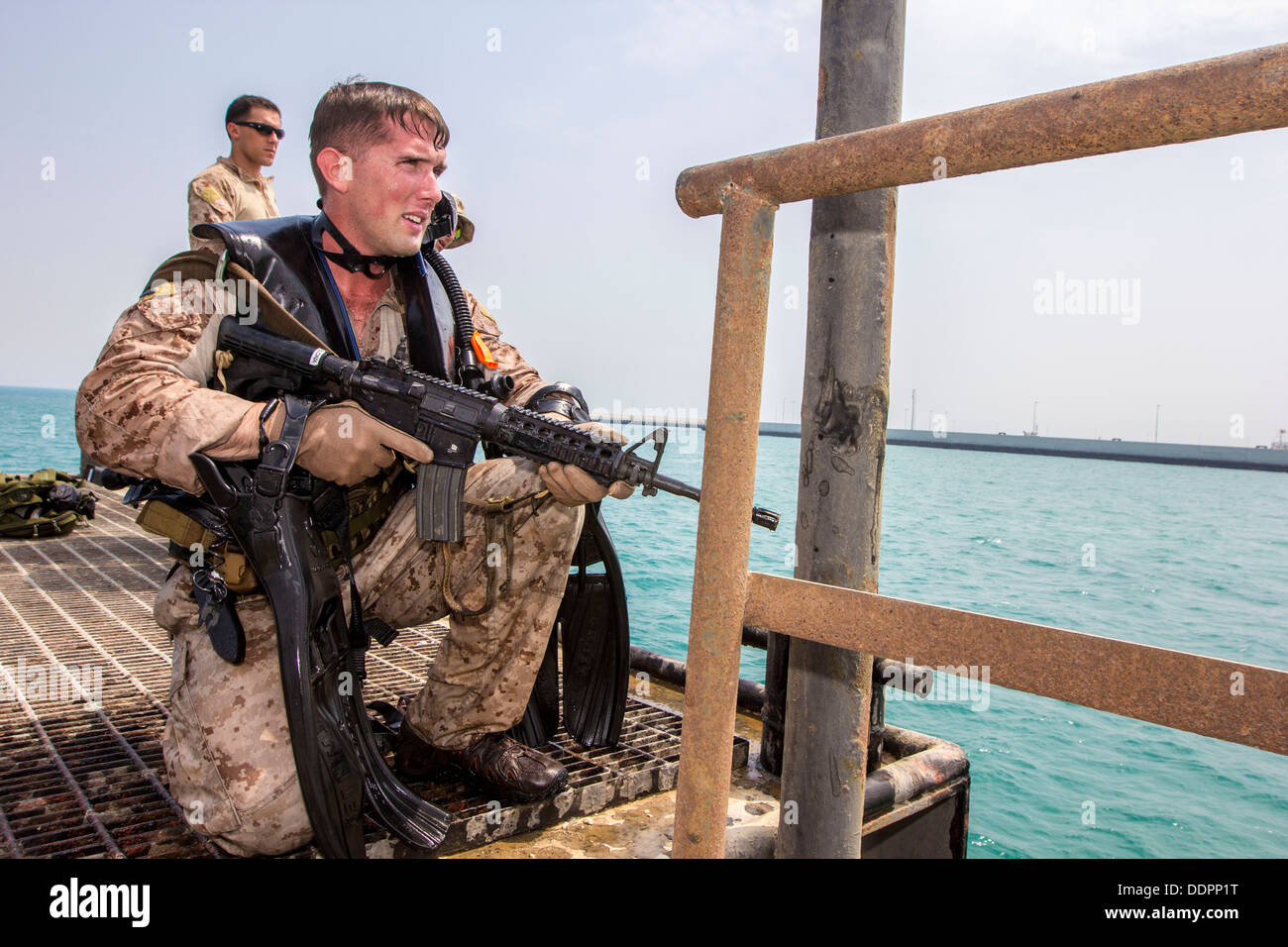 A U.S. Marine assigned to Force Reconnaissance Platoon, Maritime Raid ...