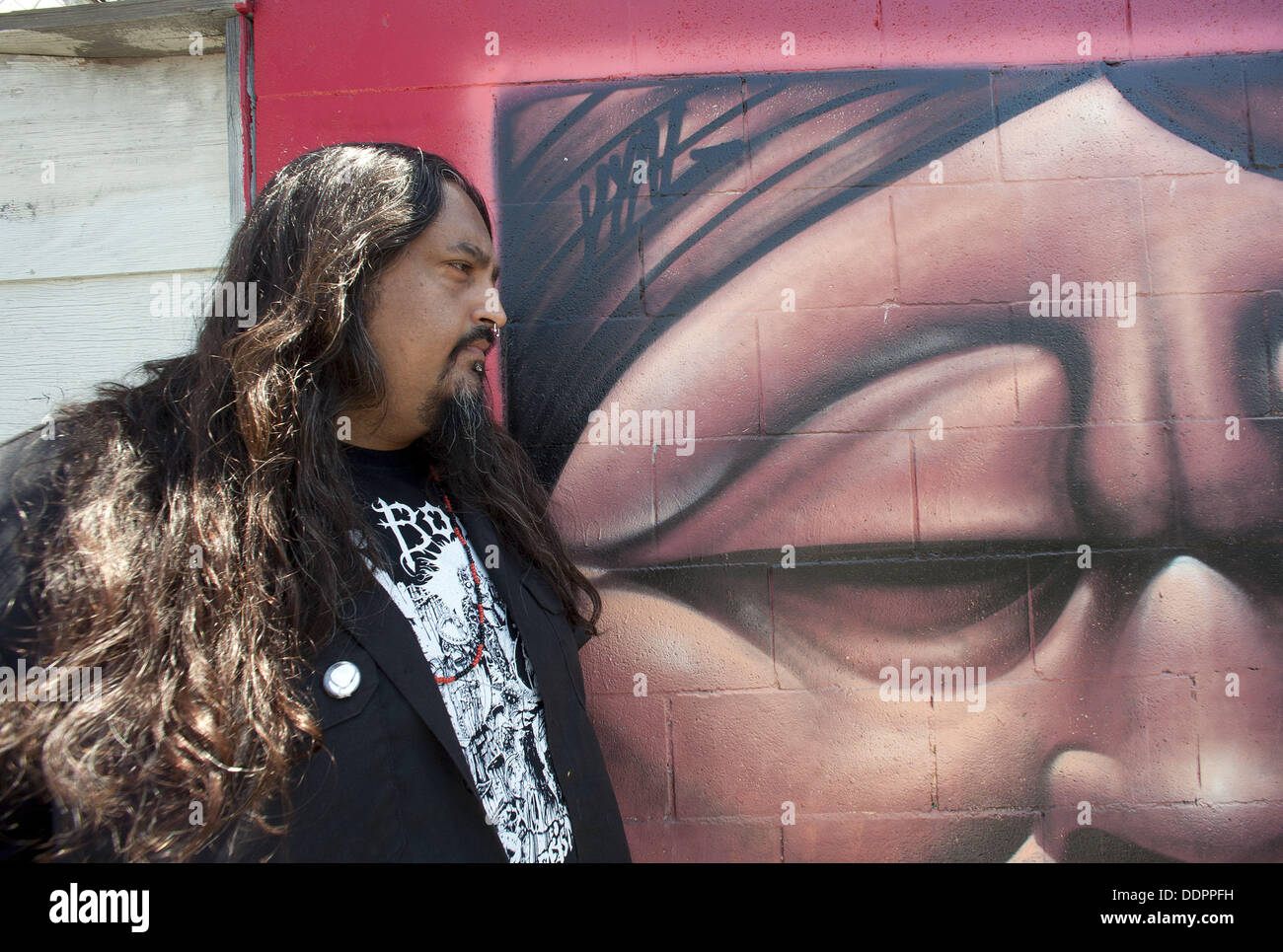 Los Angeles, CALIFORNIA, USA. 4th Sep, 2013. Muralist Vyal posses for a ...