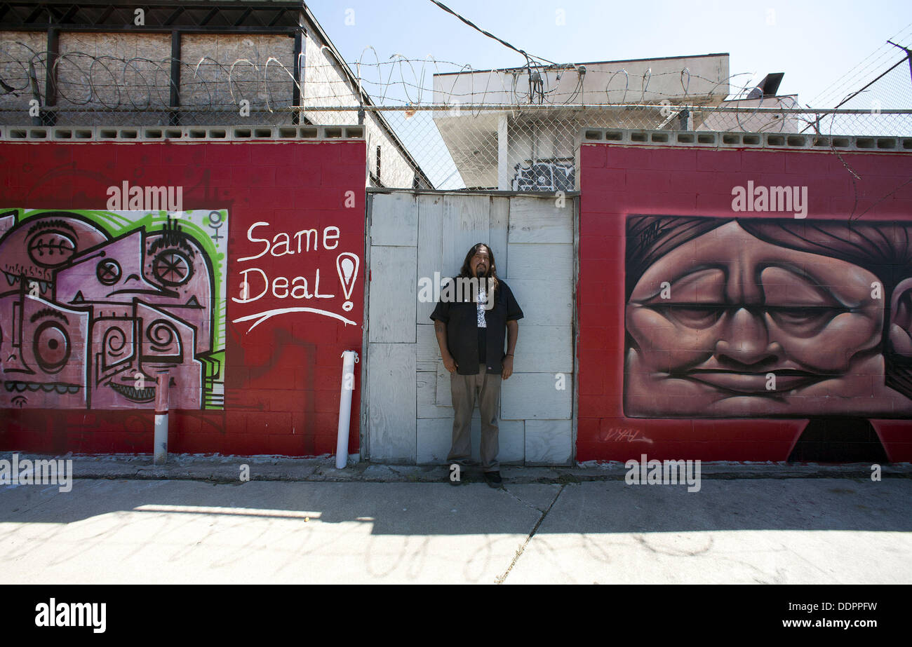 Los Angeles, CALIFORNIA, USA. 4th Sep, 2013. Muralist Vyal posses for a ...