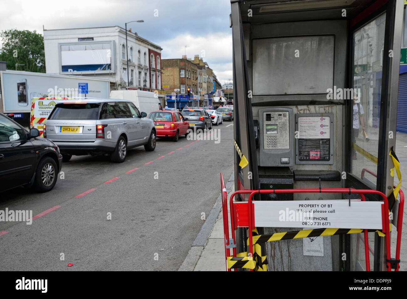 Out of order phone booth in one of many London streets Stock Photo - Alamy