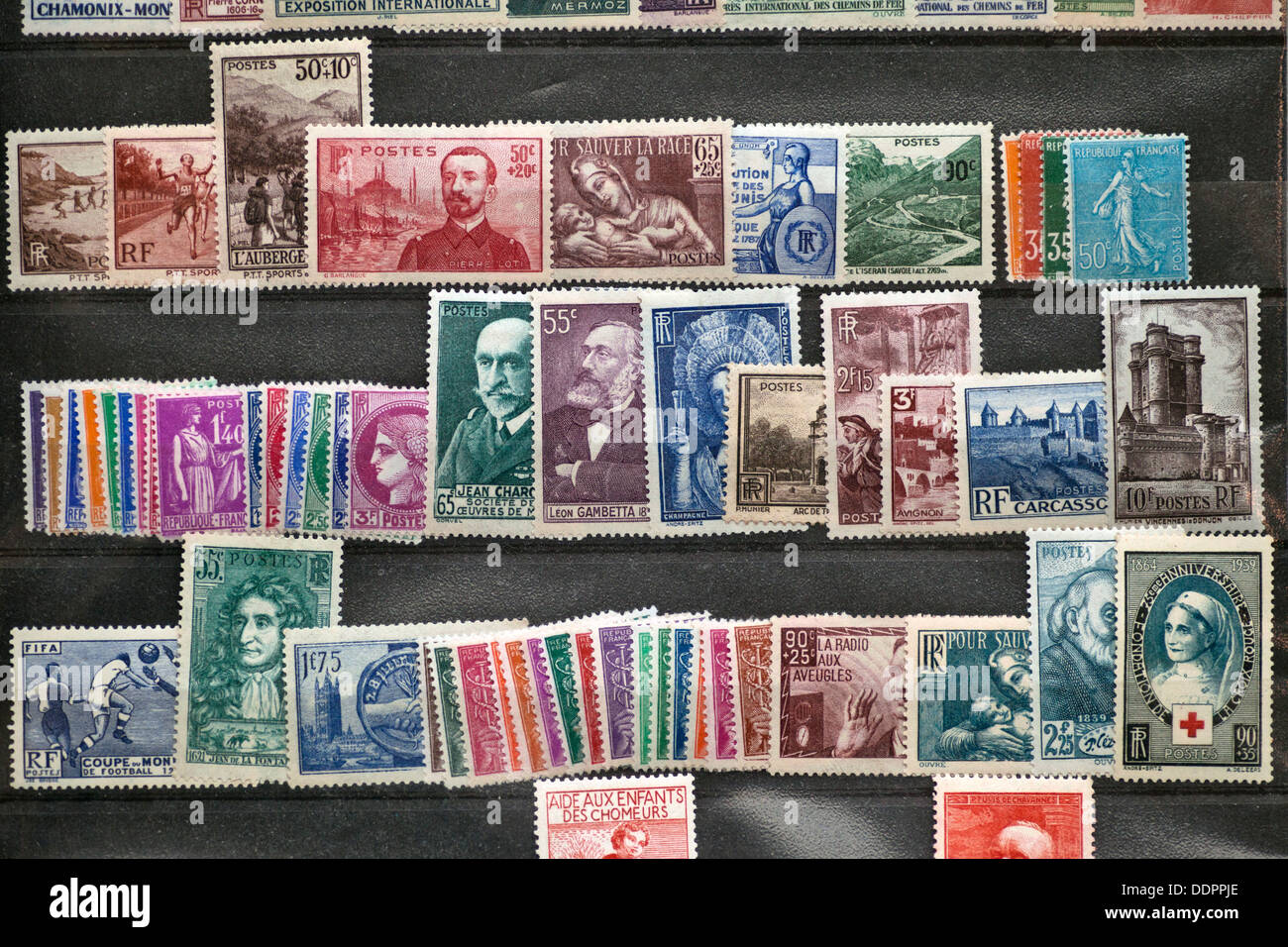 Collection of French stamps in a shop window, Paris, France Stock Photo ...
