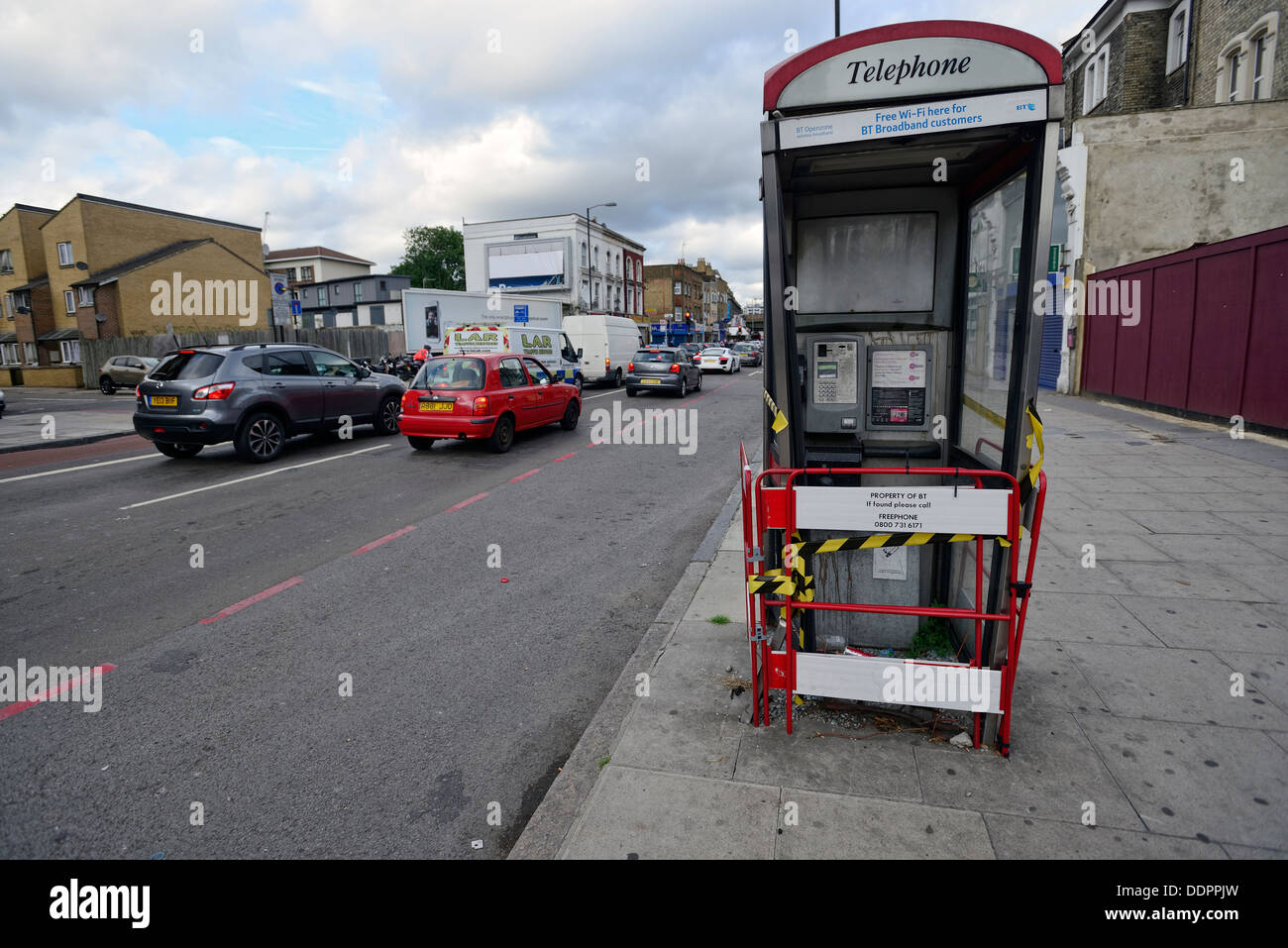 Out of order phone booth in one of many London streets Stock Photo - Alamy