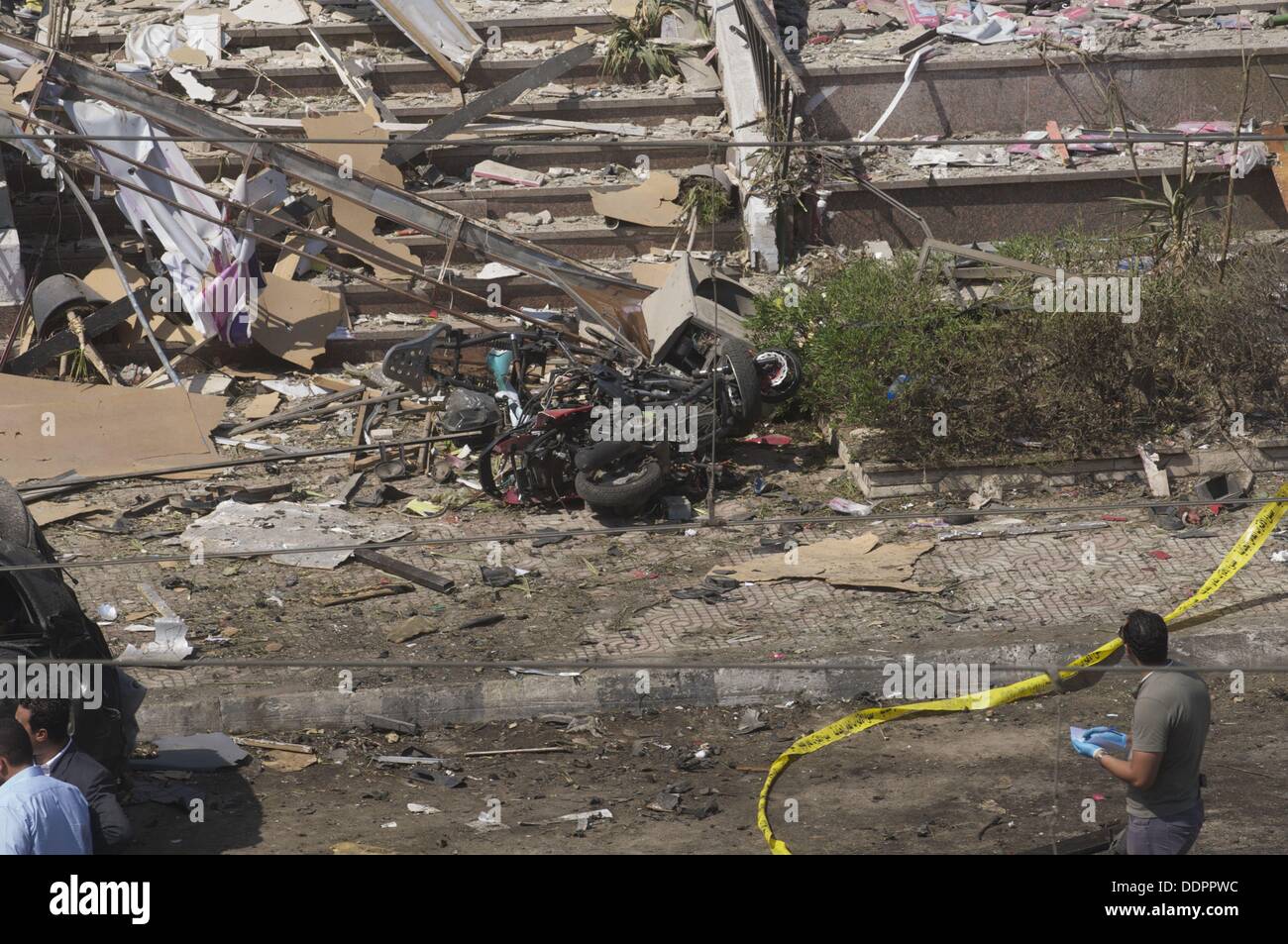 Cairo, Egypt. 5th Sep, 2013. A mangled scooter at the site of a bomb ...