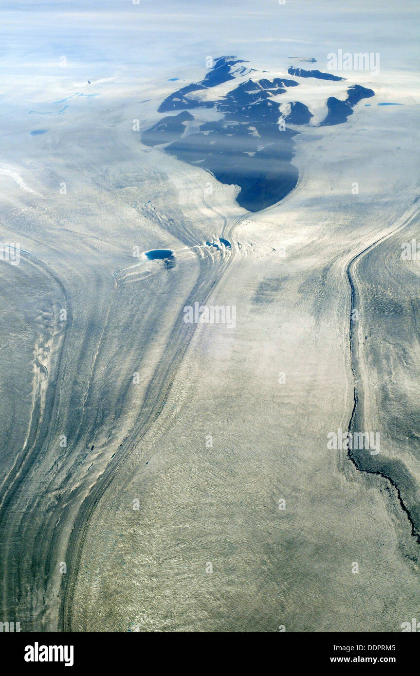 Huge glacier - with visible medial moraines and meltwater stream ...