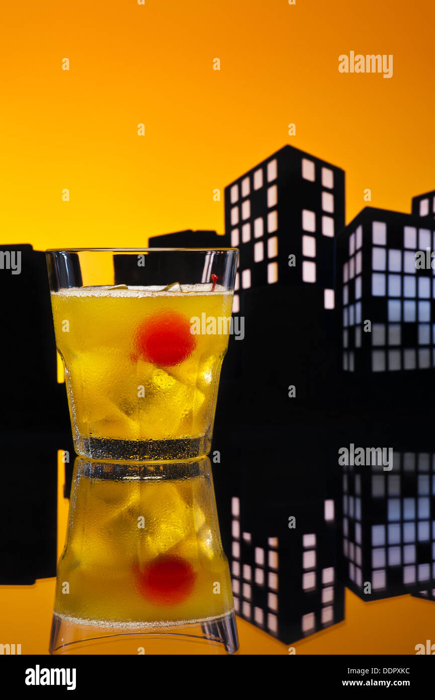 Skrew Driver cocktail in city skyline setting Stock Photo - Alamy