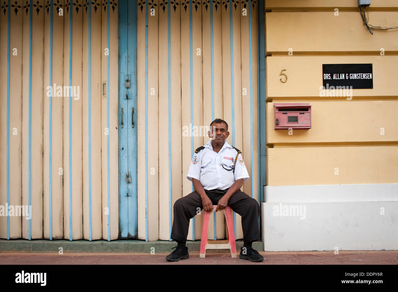 Security guard in uniform, Penang, Malaysia Stock Photo - Alamy