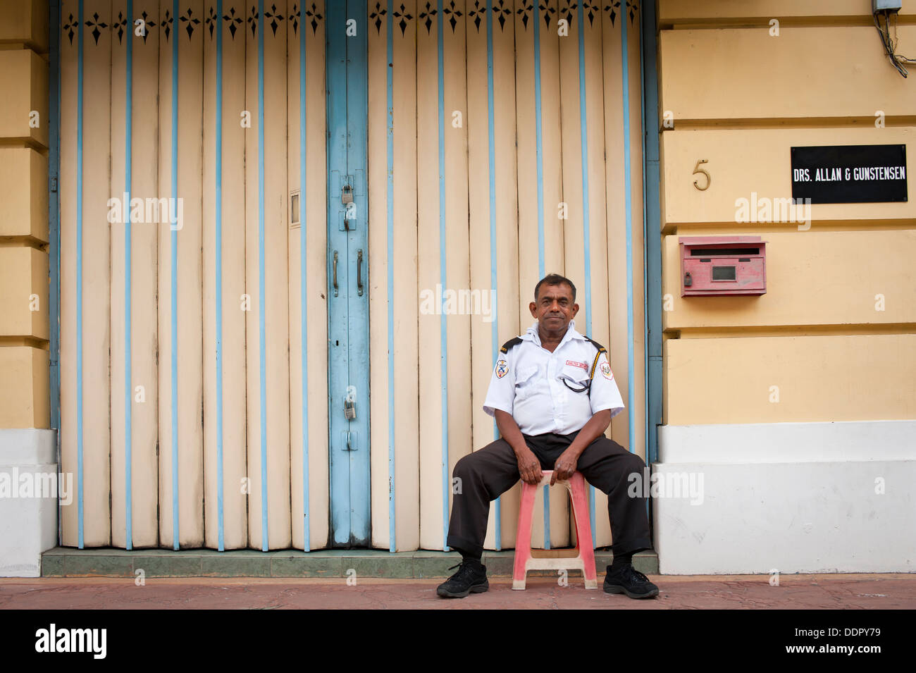 Security guard in uniform, Penang, Malaysia Stock Photo - Alamy
