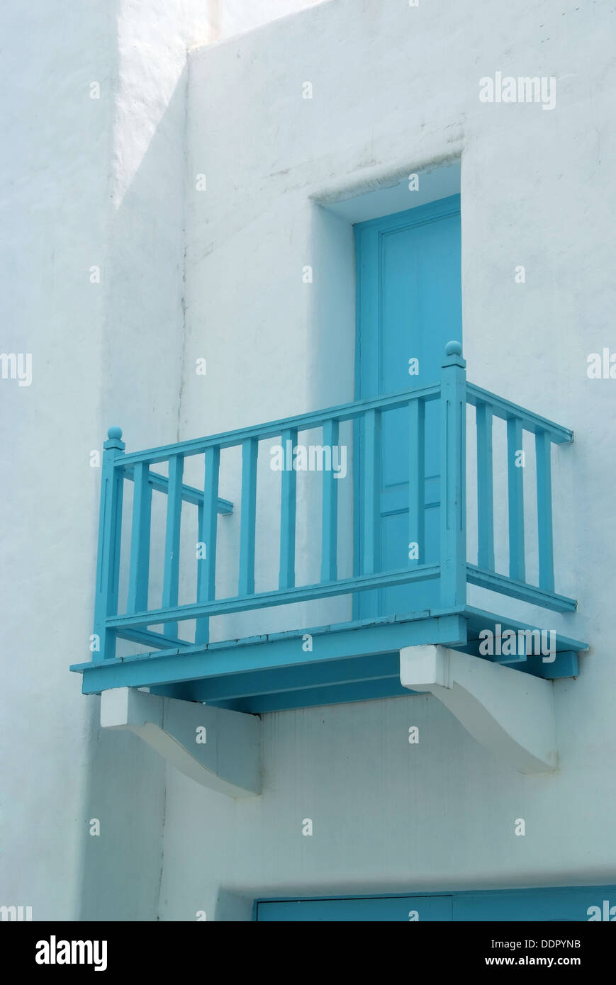Vintage blue door and terrace on the white wall Stock Photo - Alamy