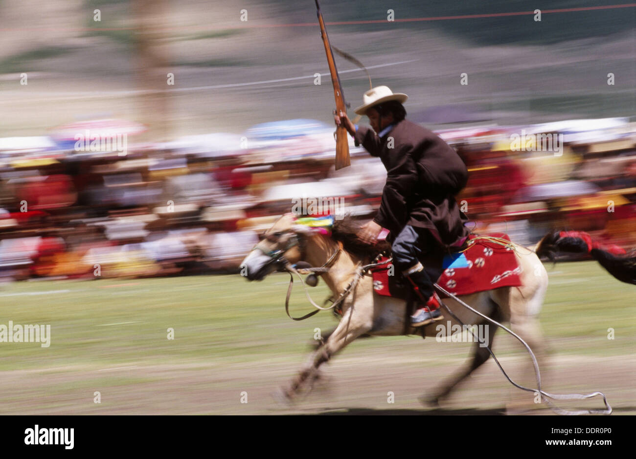 Cowboy Riding Horse Shooting Gun Stock Photos & Cowboy Riding Horse ...