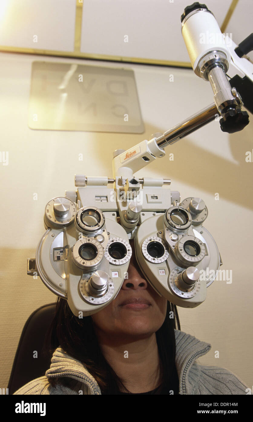Woman getting an eye exam Stock Photo - Alamy