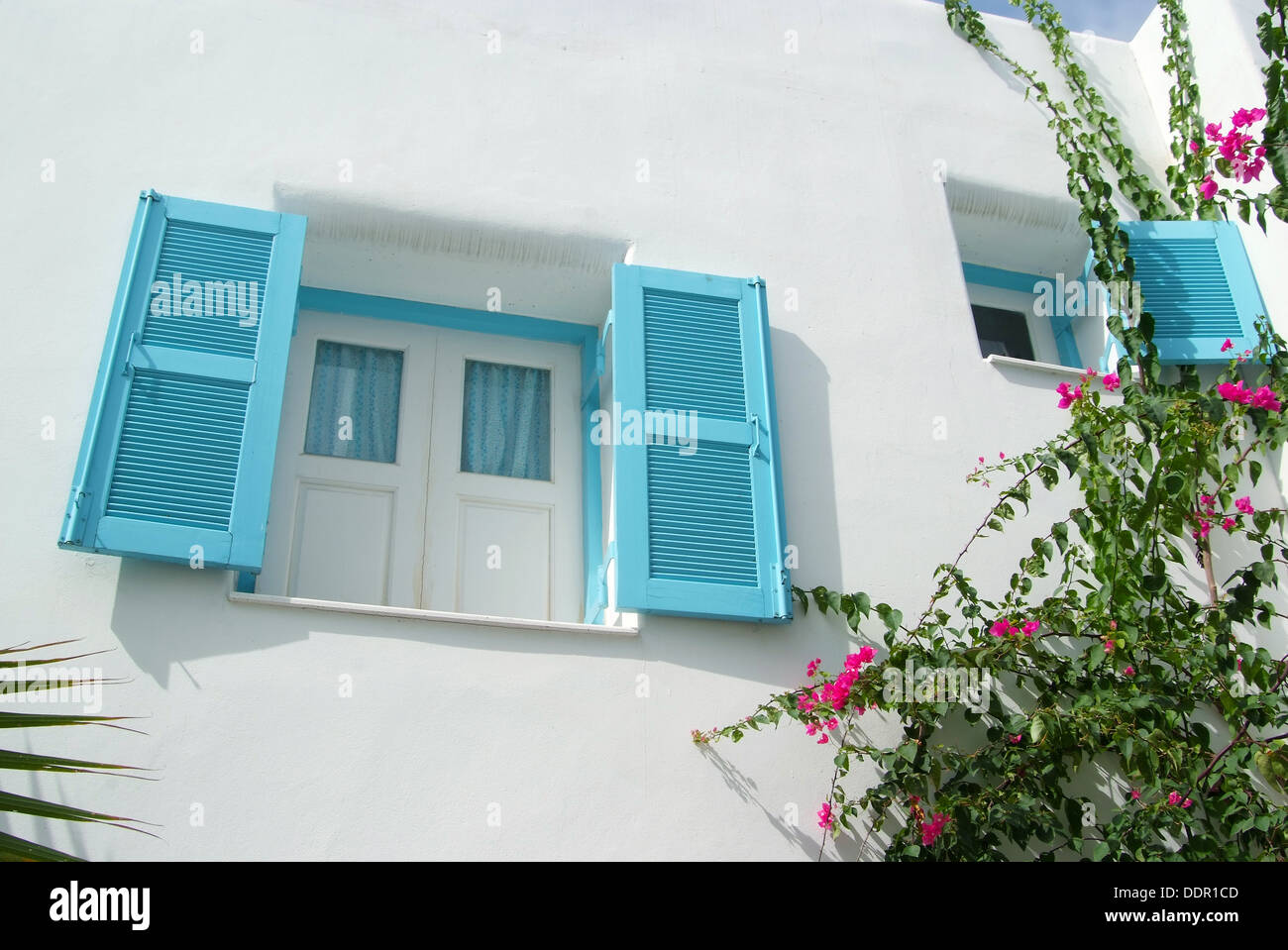 Vintage blue window on the white wall Stock Photo - Alamy