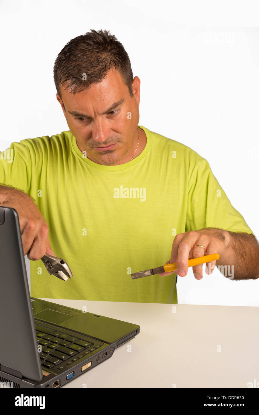 Repairing a broken computer, a tech concept Stock Photo - Alamy