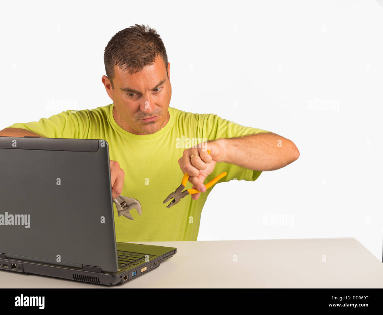 Repairing a broken computer, a tech concept Stock Photo - Alamy