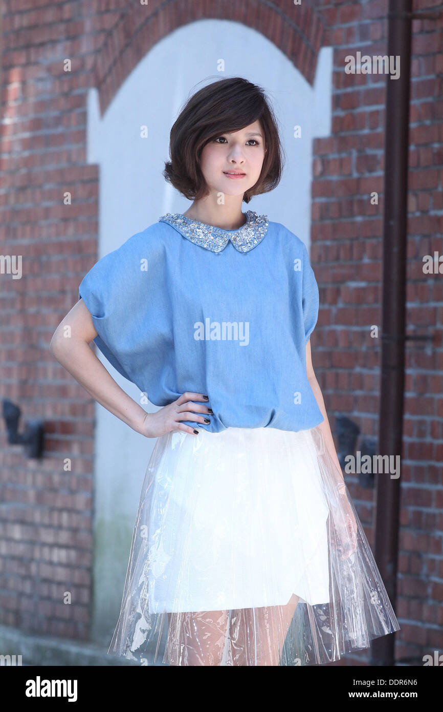 Taipei, China. 5th Sep, 2013. Singer Claire takes pictures for her new ...