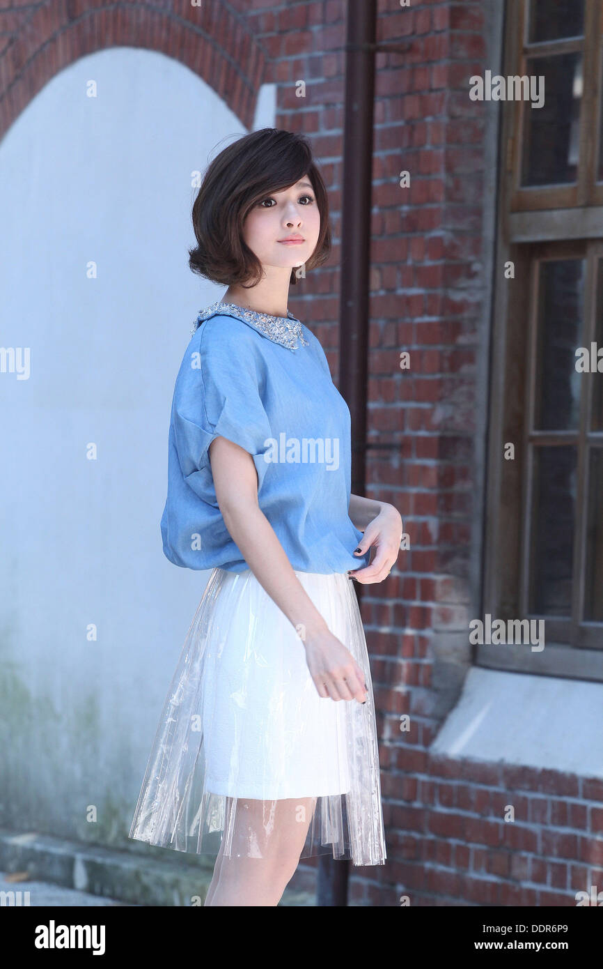 Taipei, China. 5th Sep, 2013. Singer Claire takes pictures for her new ...