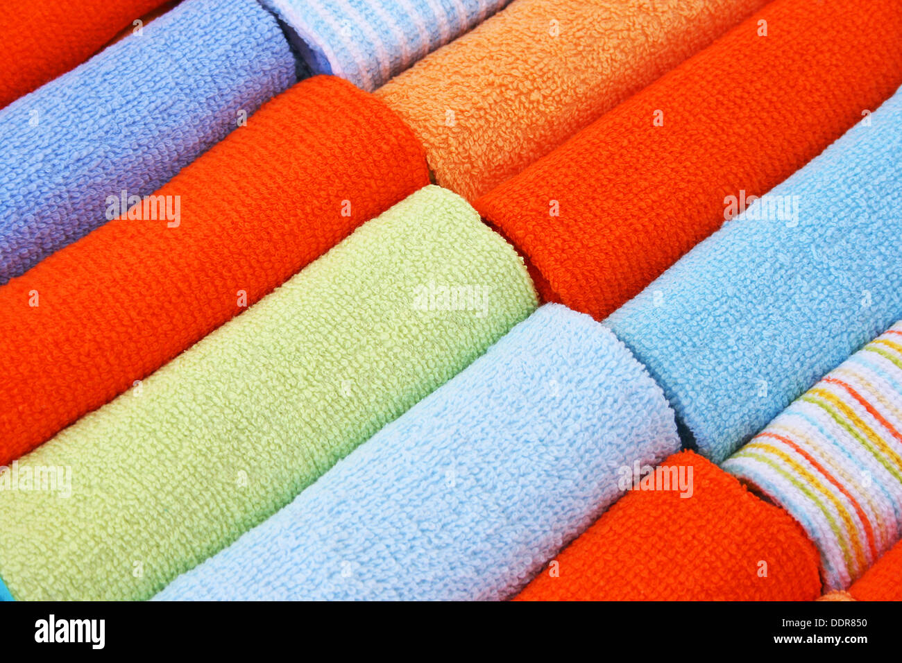Colorful towels as a background Stock Photo - Alamy