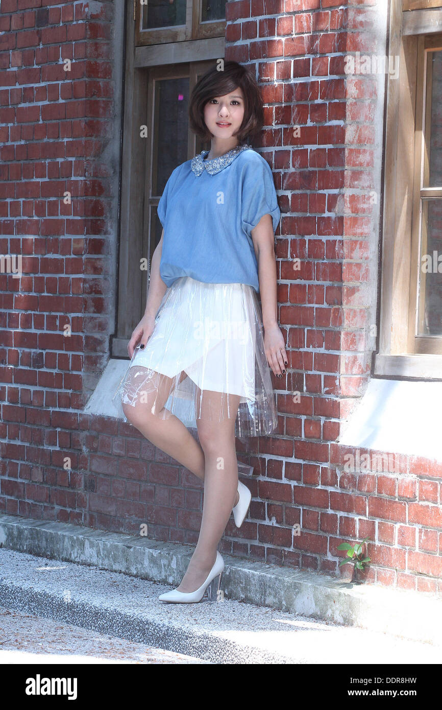 Taipei, China. 5th Sep, 2013. Singer Claire takes pictures for her new ...