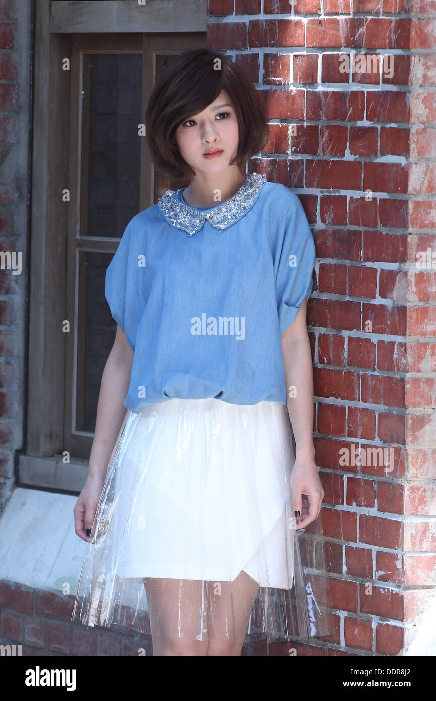 Taipei, China. 5th Sep, 2013. Singer Claire takes pictures for her new ...