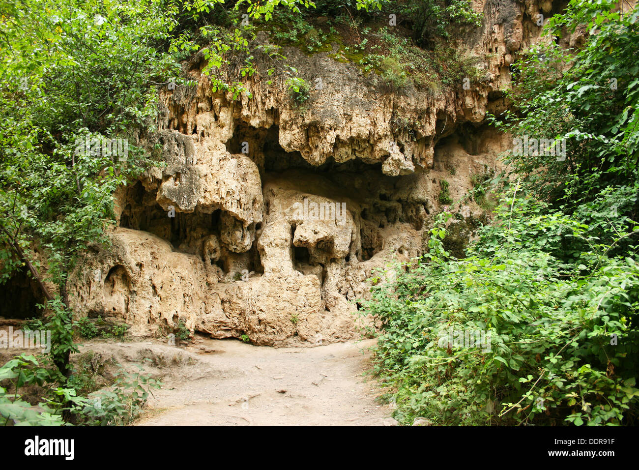 Caves at Devil bridge natural monument in the Syunik region of Armenia ...
