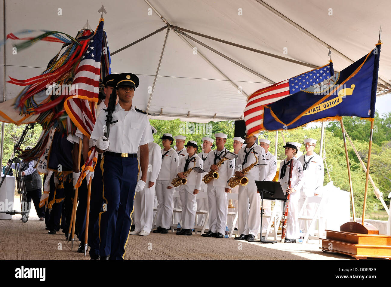 The Joint Service Color Guard parades the colors signifying the start ...