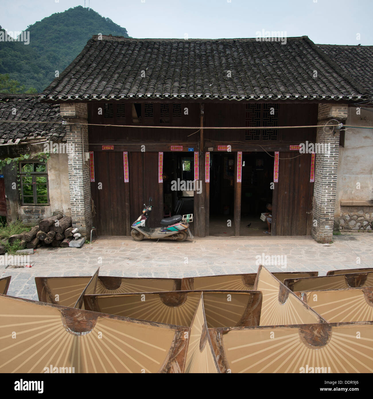 Painted fans in front of a house, Fuli Village, Yangshuo, Guilin ...