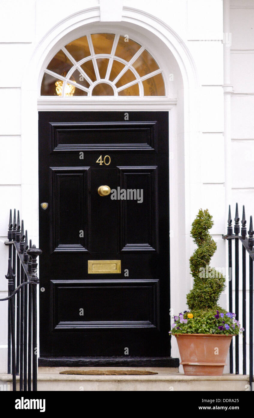 Typical entrance door with sculpted plant. London. England Stock Photo ...