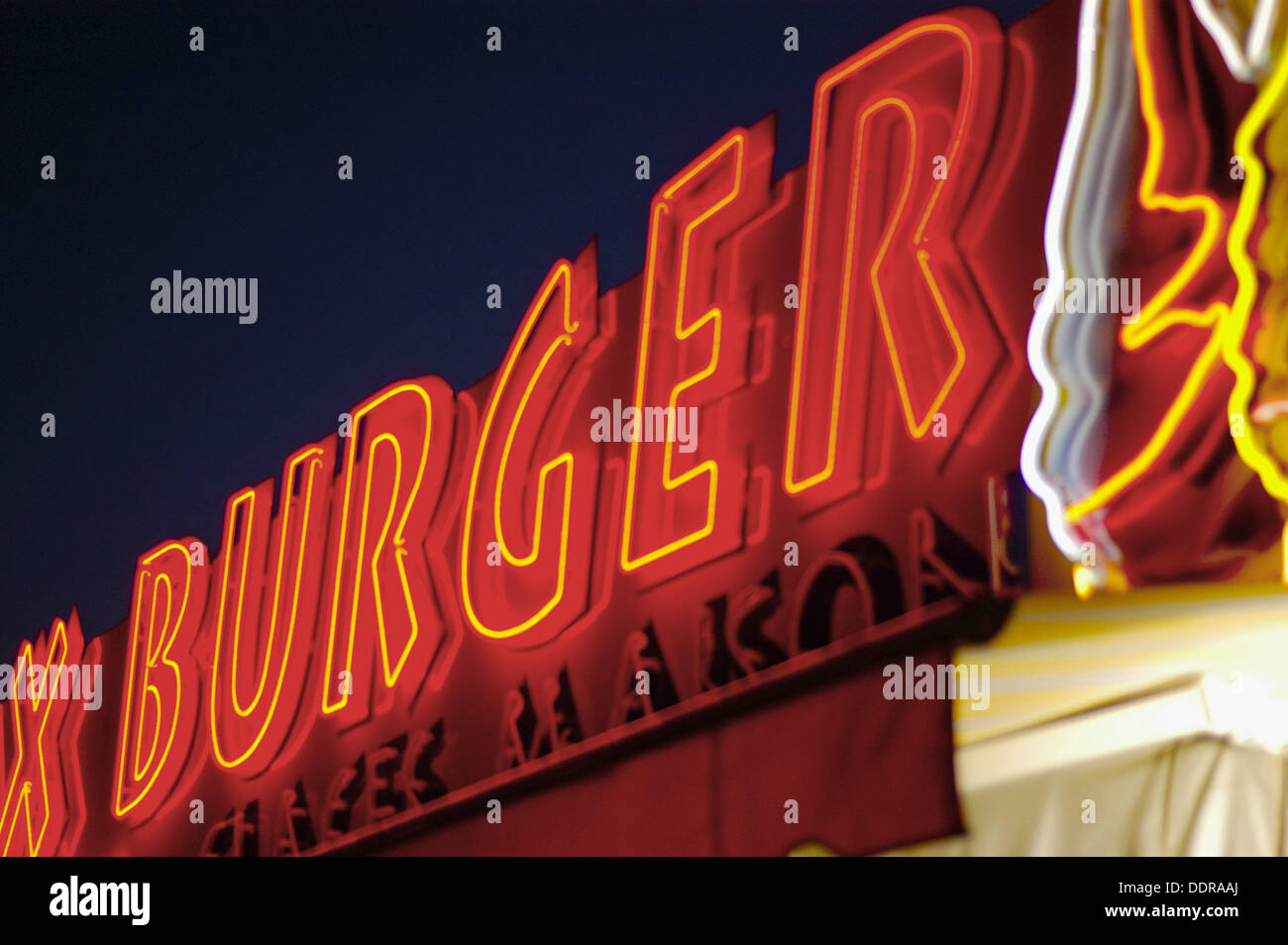 Neon hamburger sign. Riviera. France Stock Photo - Alamy