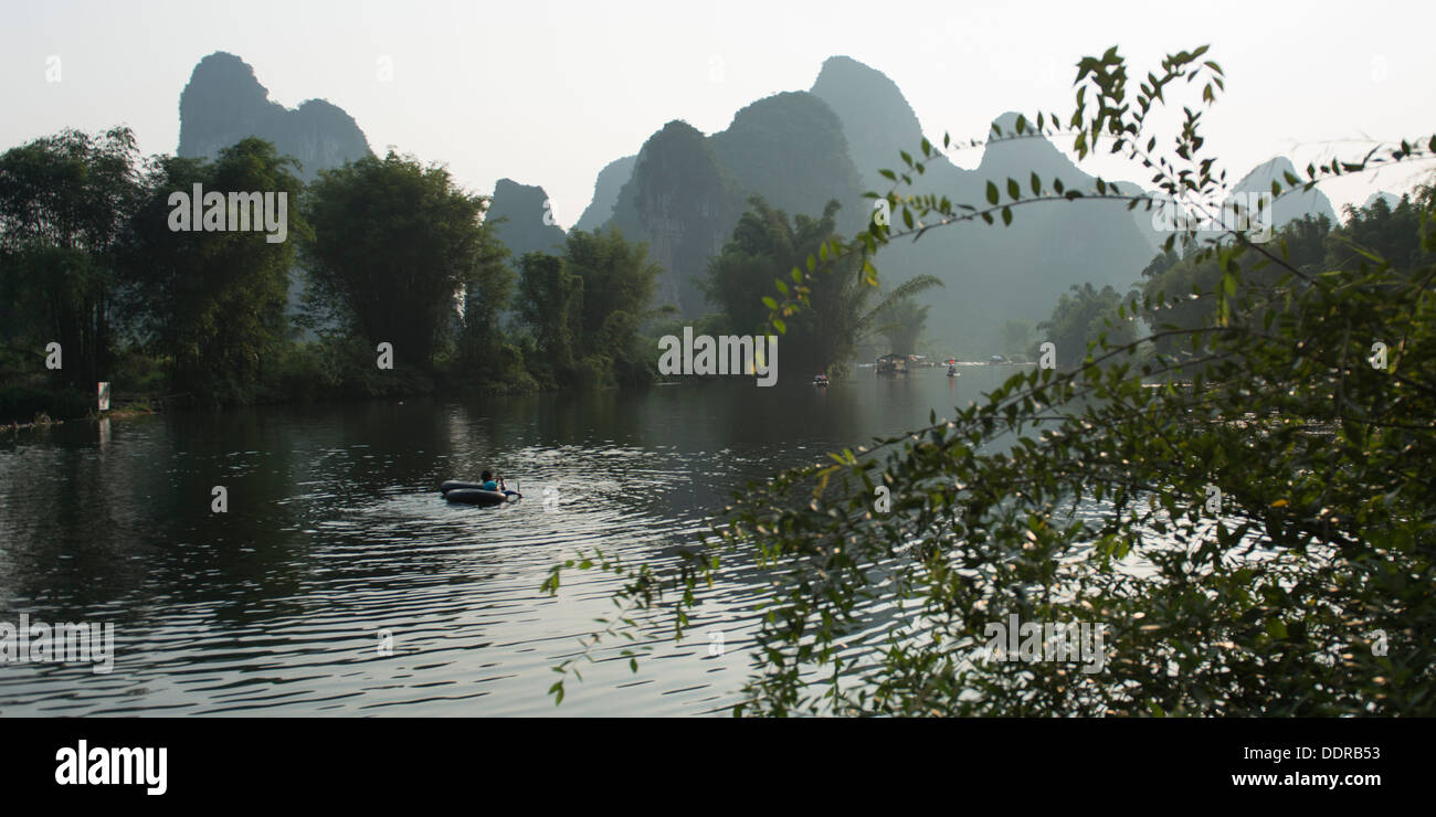 View of Yulong River with mountains in the background, Yangshuo, Guilin ...